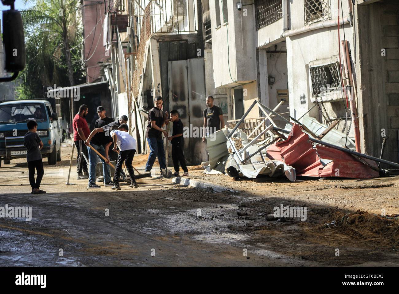 Tulkarm, Palestine. 08th Nov, 2023. Palestinians walk through a ...