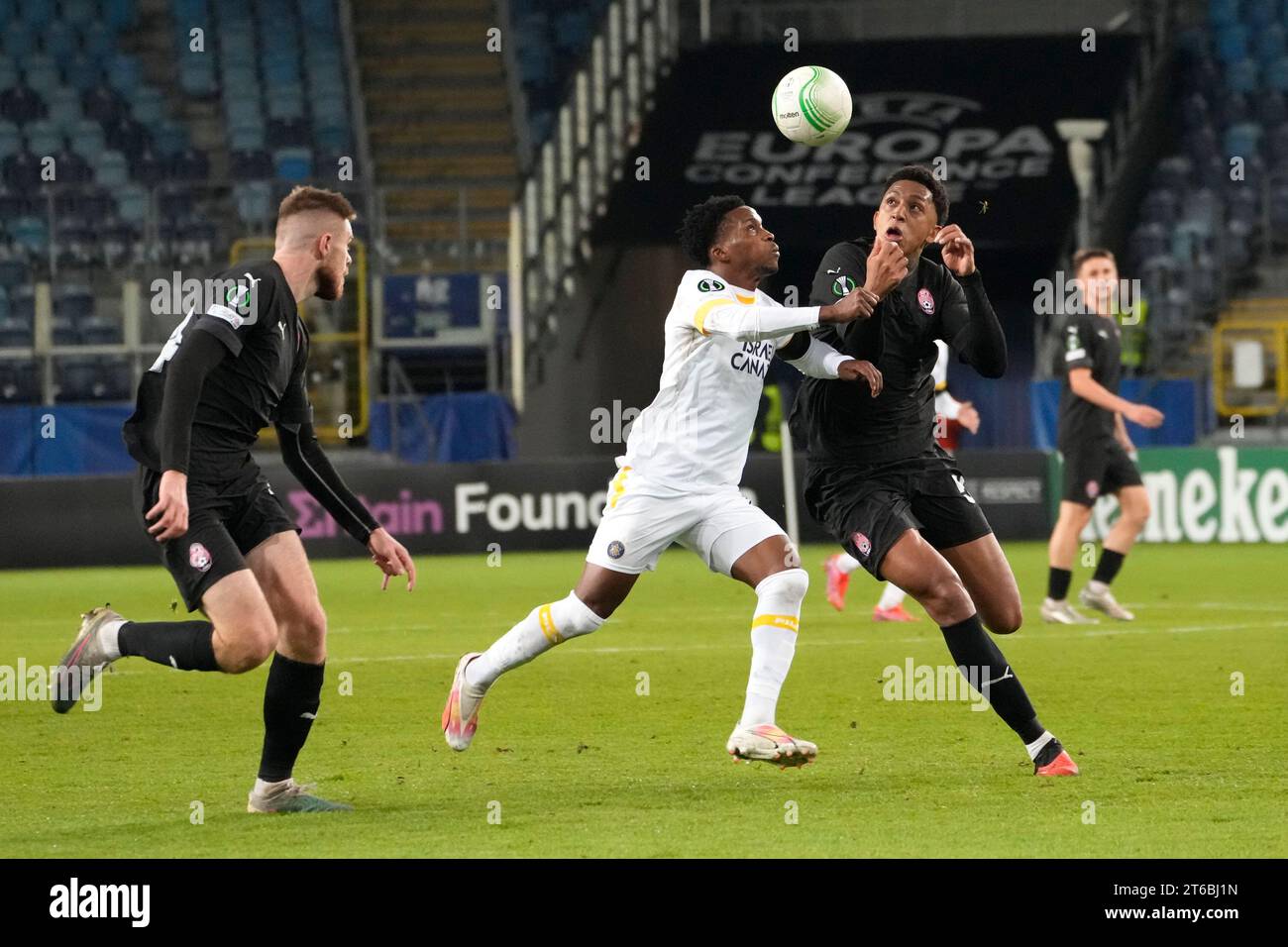 Maccabi Tel Aviv's Felicio Milson, center, and Zorya's Jordan, right ...