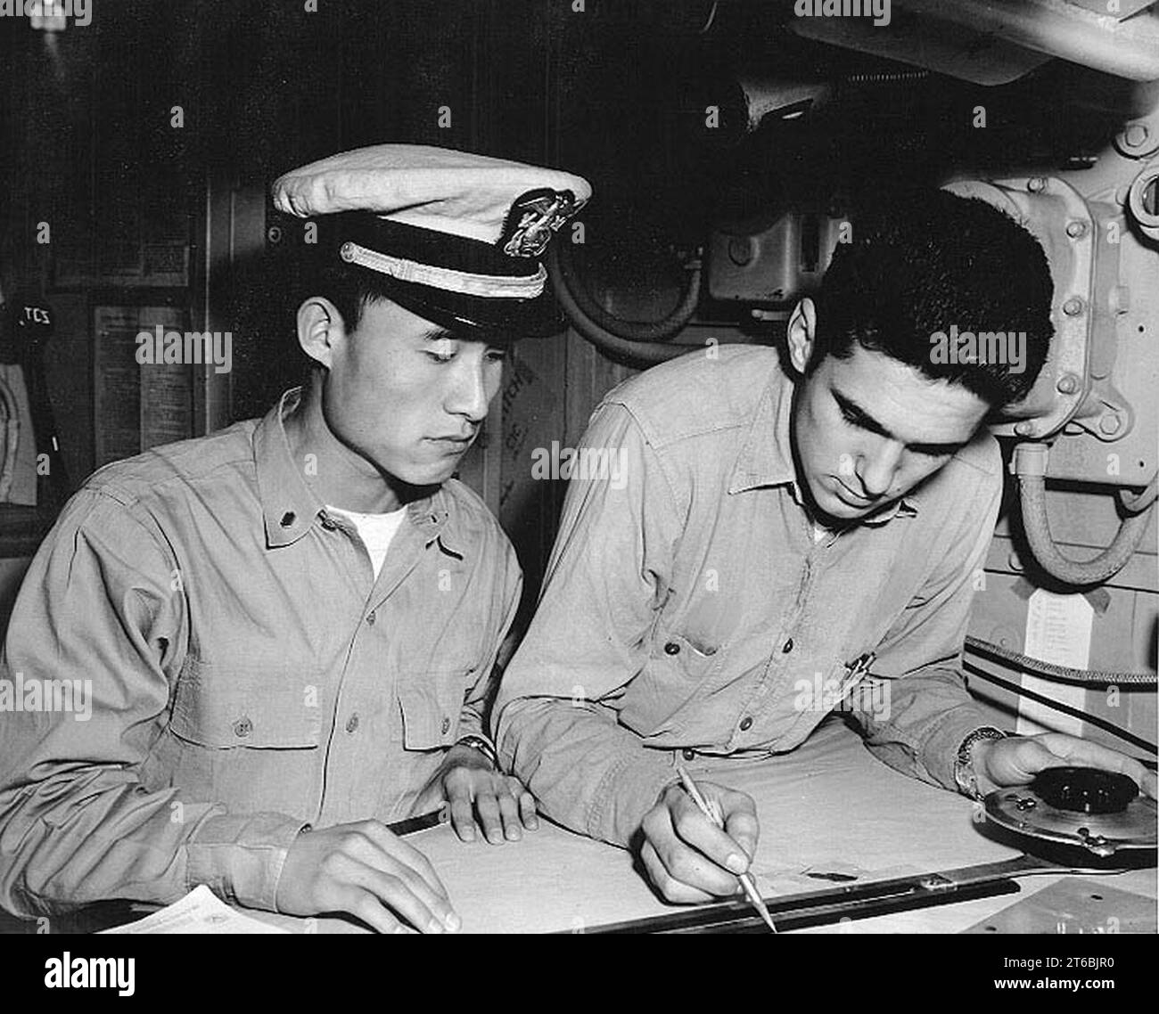 USN Seaman Eckard instructs Ensign An of ROK Navy Stock Photo - Alamy