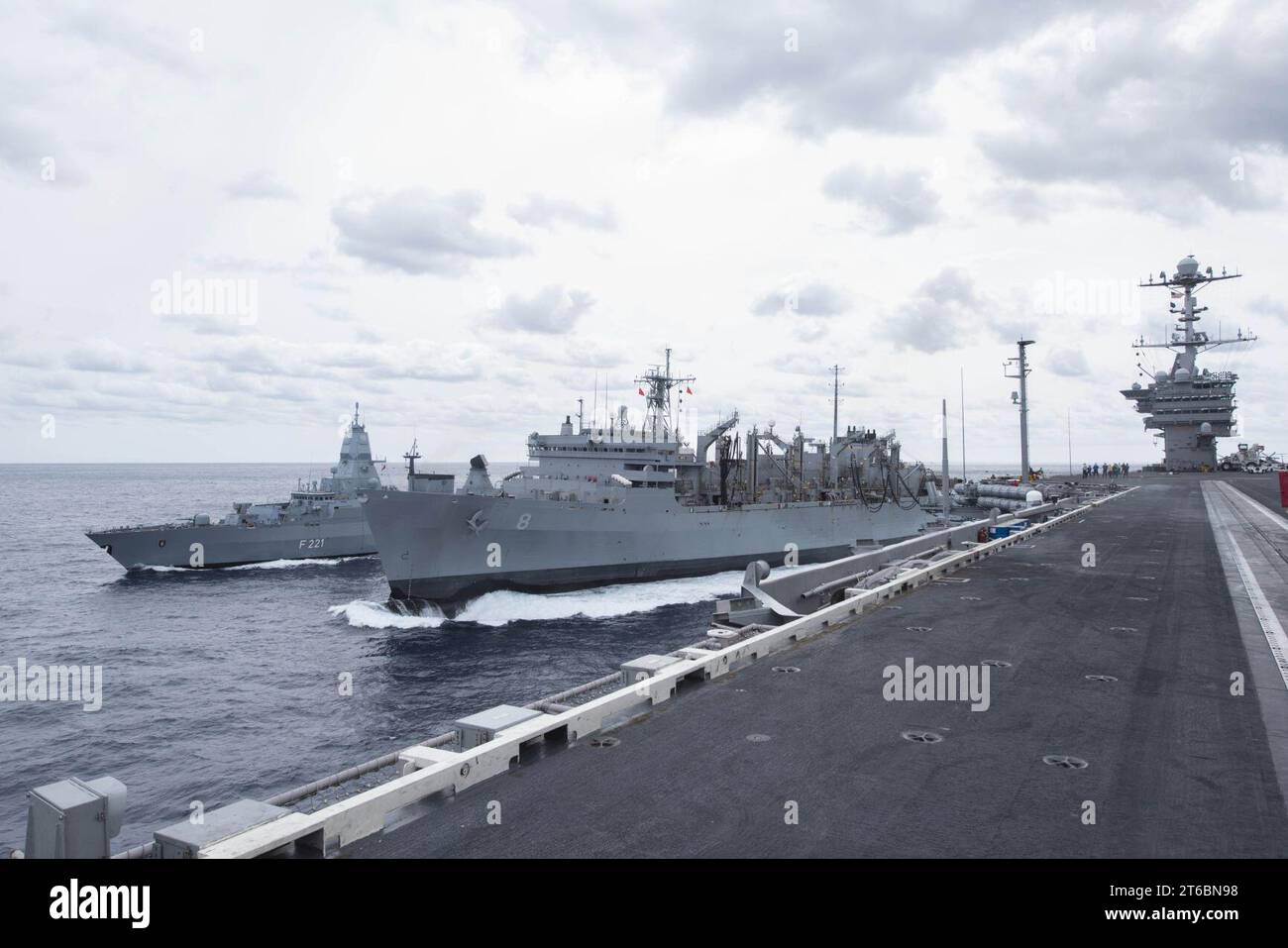 USNS Arctic (T-AOE-8) replenishes USS Harry S. Truman (CVN-75) and the ...