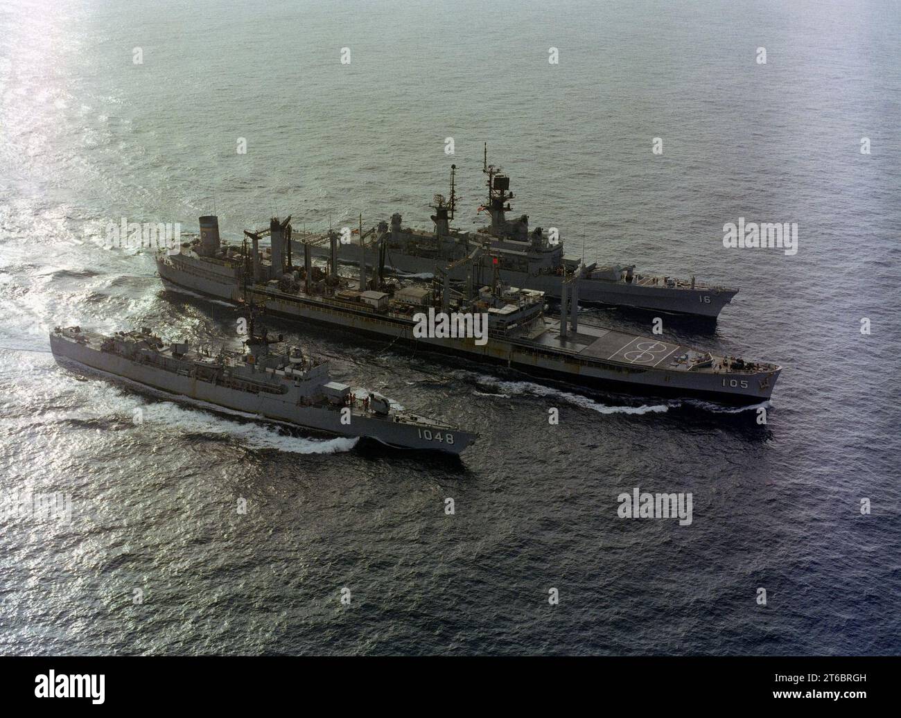 USNS Mispillion (T-AO-105) refuels USS Leahy (CG-16) and USS Sample (FF ...