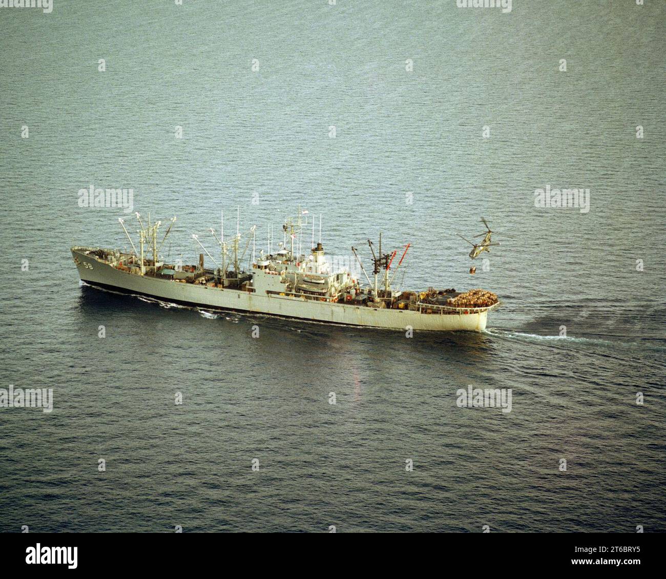 USNS Rigel (T-AF-58) underway in the Indian Ocean on 6 June 1983 ...