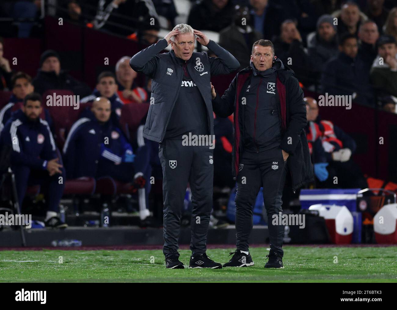 West Ham United manager David Moyes (left) and assistant Billy McKinlay ...