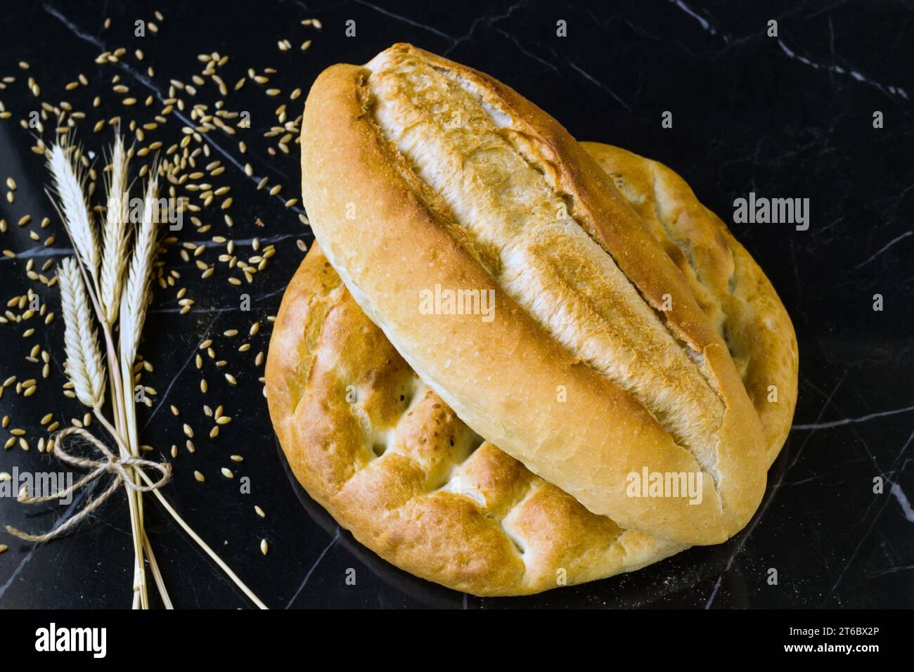Traditional Turkish Ramadan Bread with a standard bread and wheat ears ...
