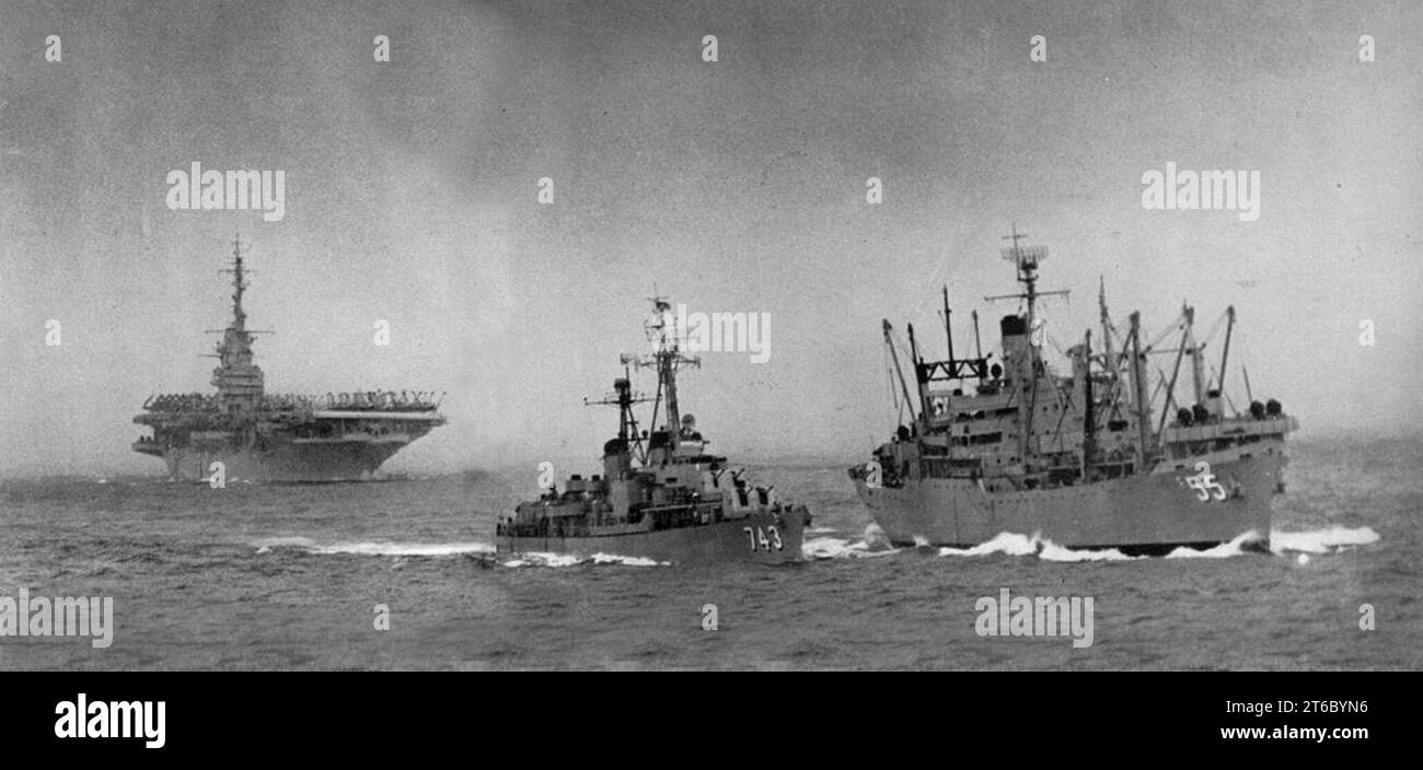 USS Aludra (AF-55) underway with USS Southerland (DD-743) and USS ...