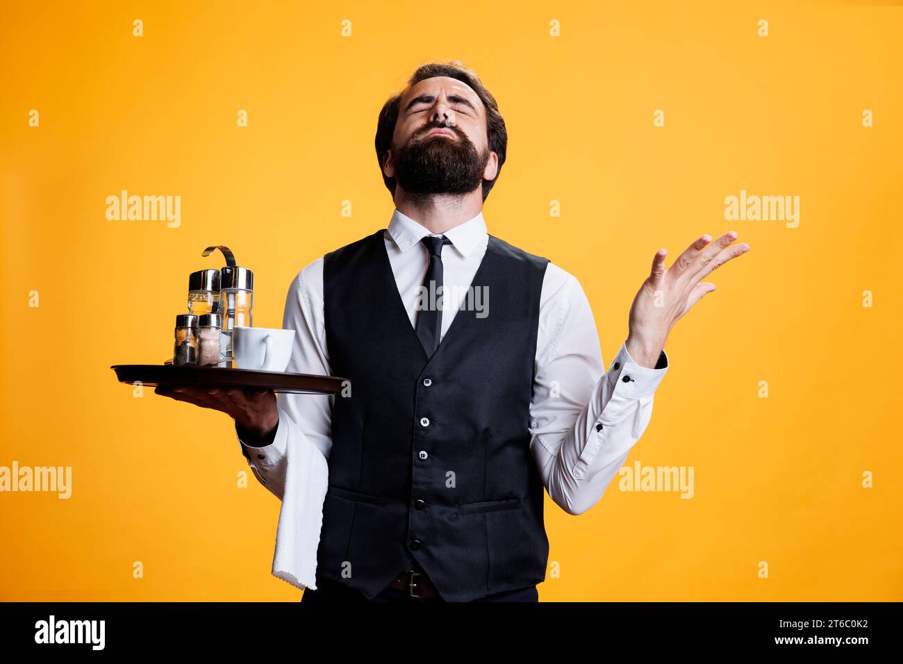 Spiritual waiter talking to jesus in studio, praying for success and ...