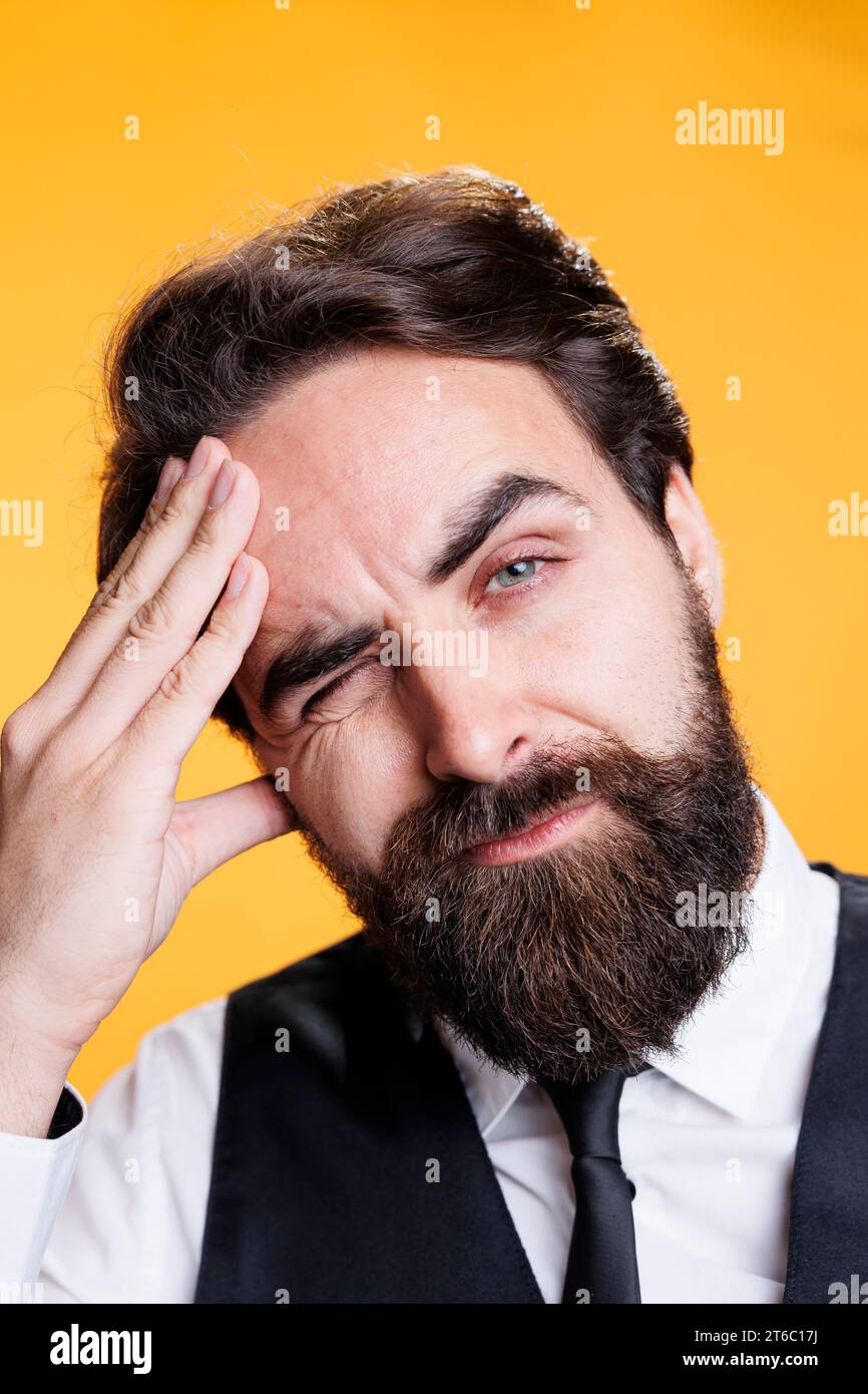 Hurt employee with painful migraine, rubbing temples and feeling ...