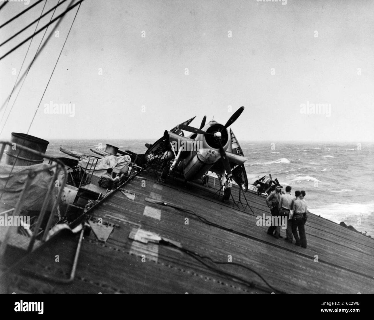 USS Anzio (CVE-57) rolling heavily during Typhoon Cobra, 17 December ...