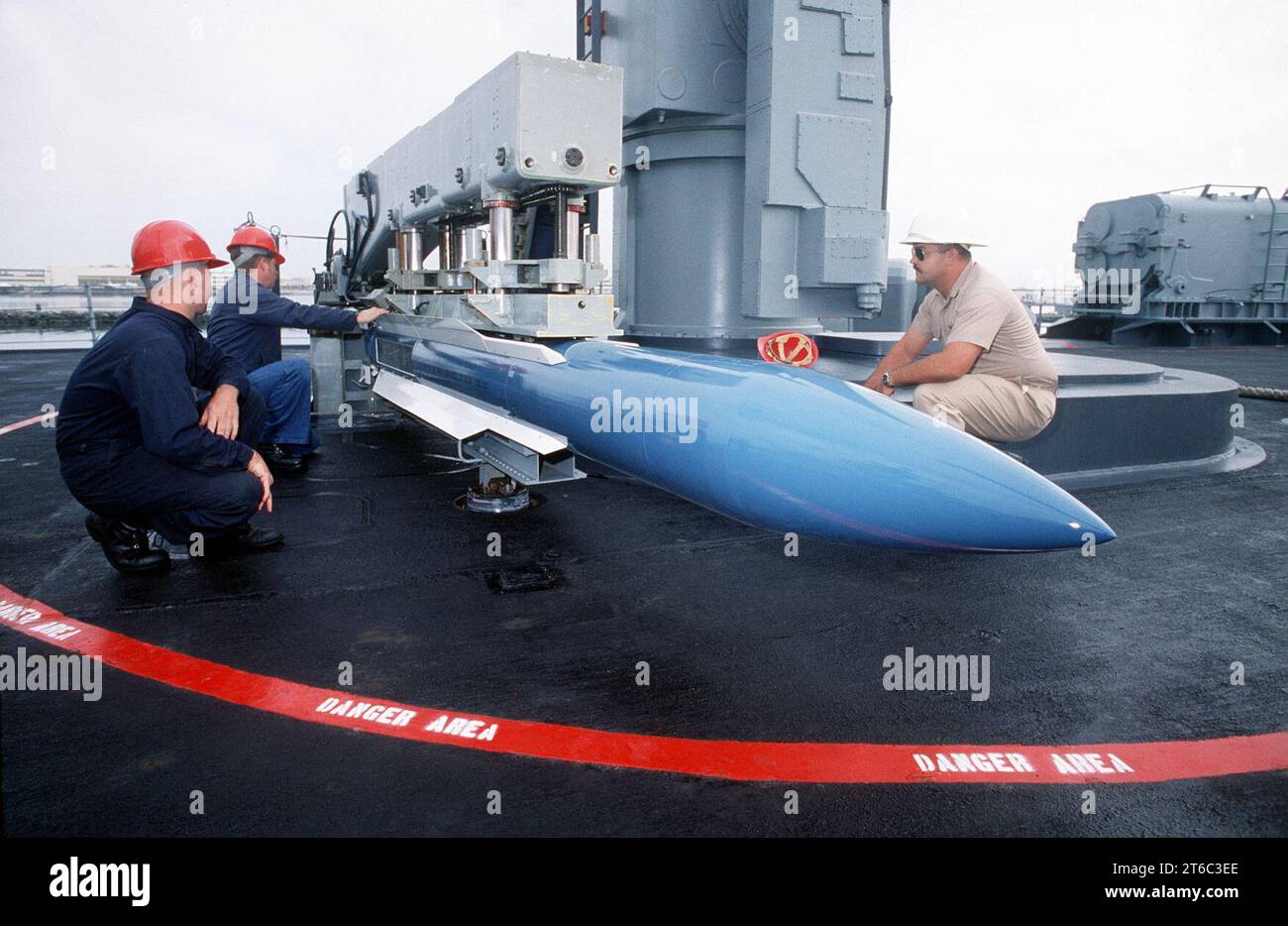 USS Arkansas (CGN-41) loading a GMTR in aft Mk 26 launcher Stock Photo ...