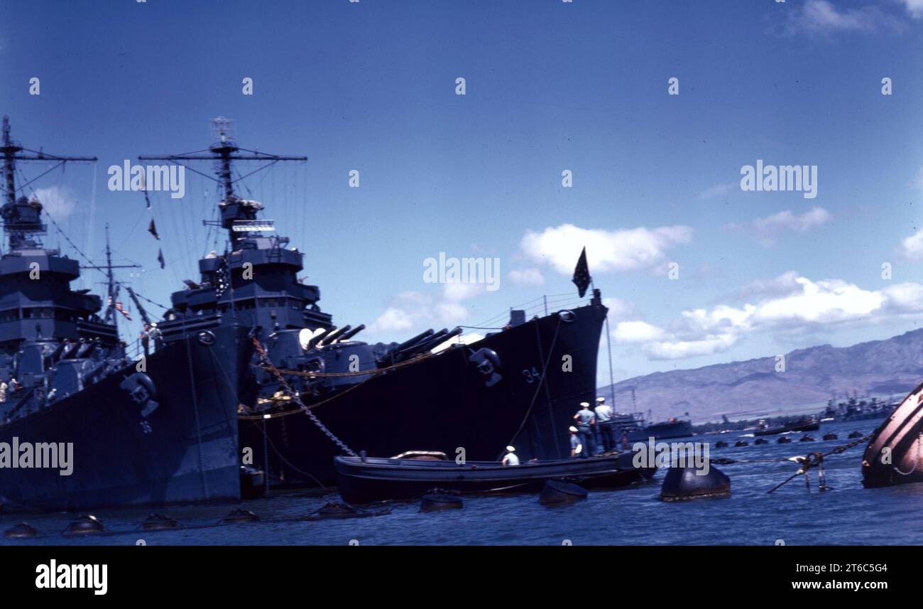 USS Astoria (CA-34) and USS Minneapolis (CA-36) moored in Pearl Harbor ...