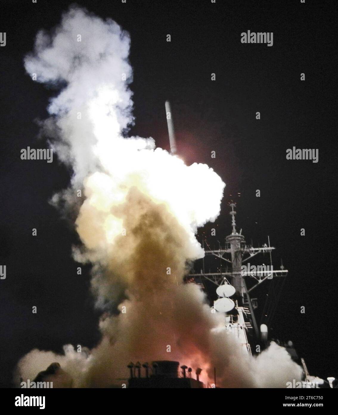 USS Barry (DDG-52) launching a Tomahawk missile in support of Operation ...