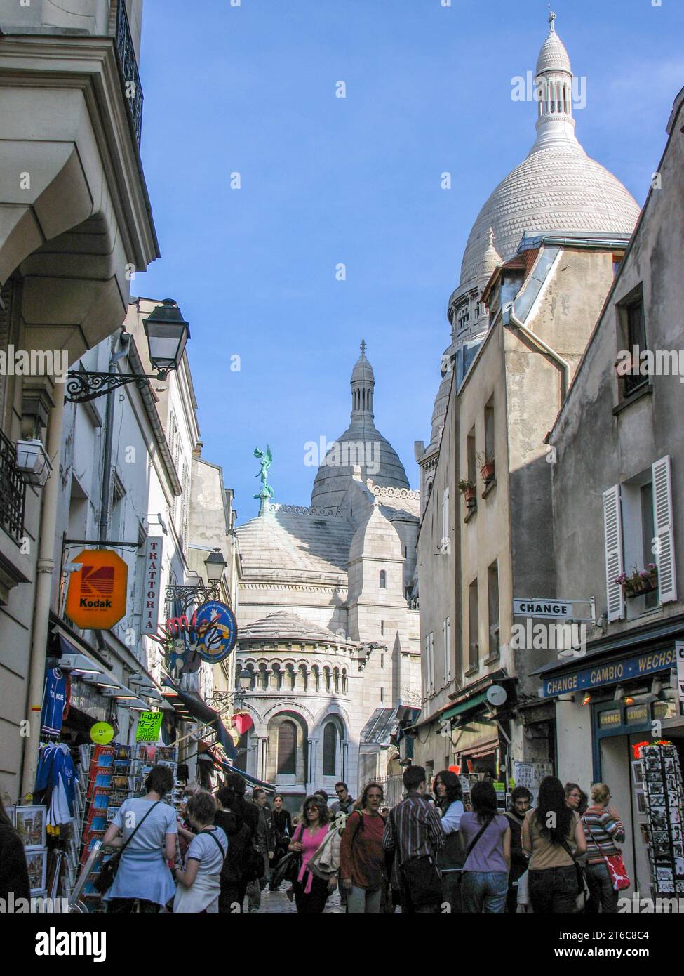 The white domes of Sacre-Cooeur tower over the neighborhood of ...
