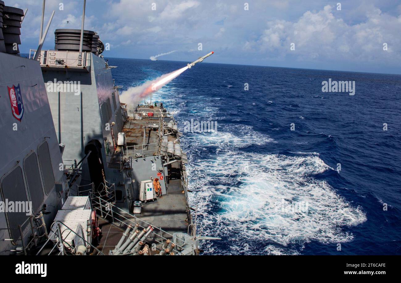 USS Benfold conducts a live fire of a harpoon missile during Valiant ...