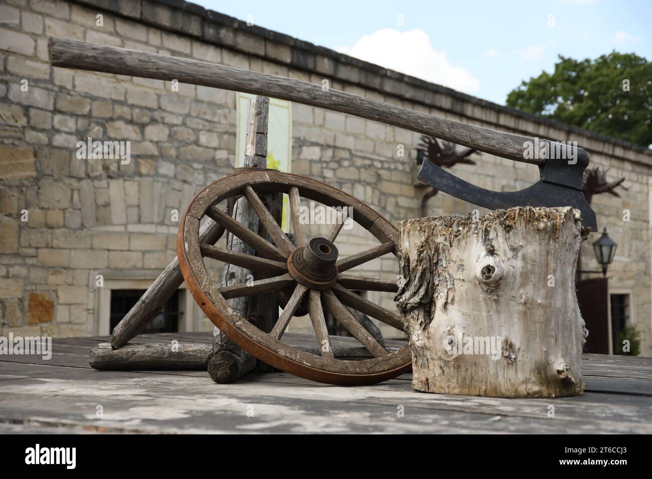 TERNOPIL, UKRAINE - AUGUST 23, 2023 Axe of executioner on wooden stump ...