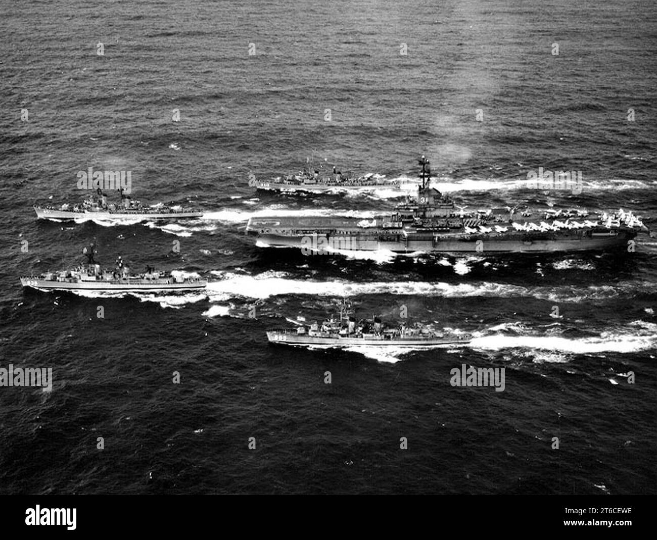 USS Bon Homme Richard (CVA-31) underway with destroyers in November ...