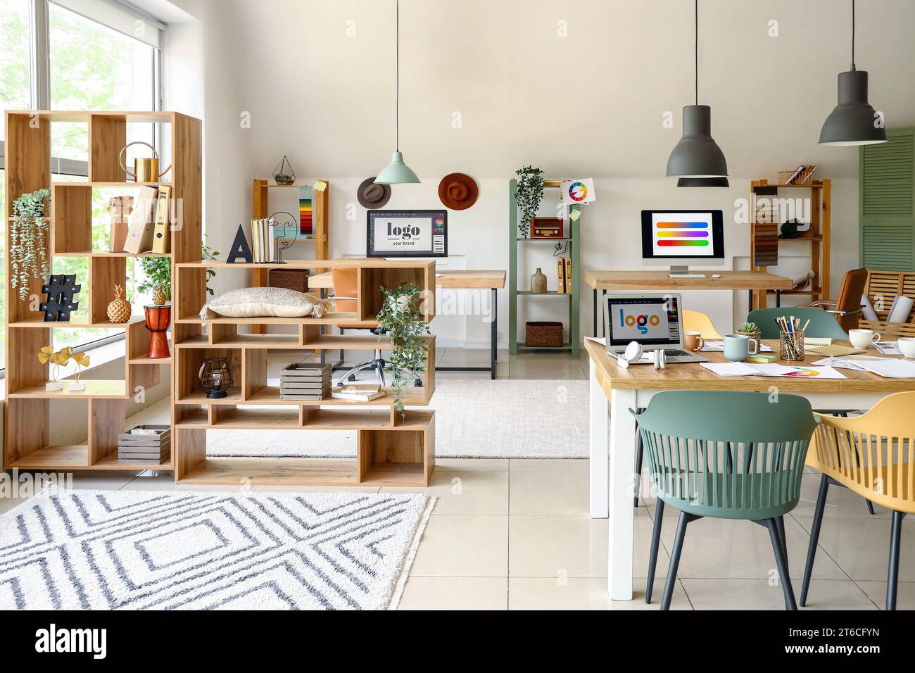 Interior of office with graphic designer's workplaces Stock Photo - Alamy