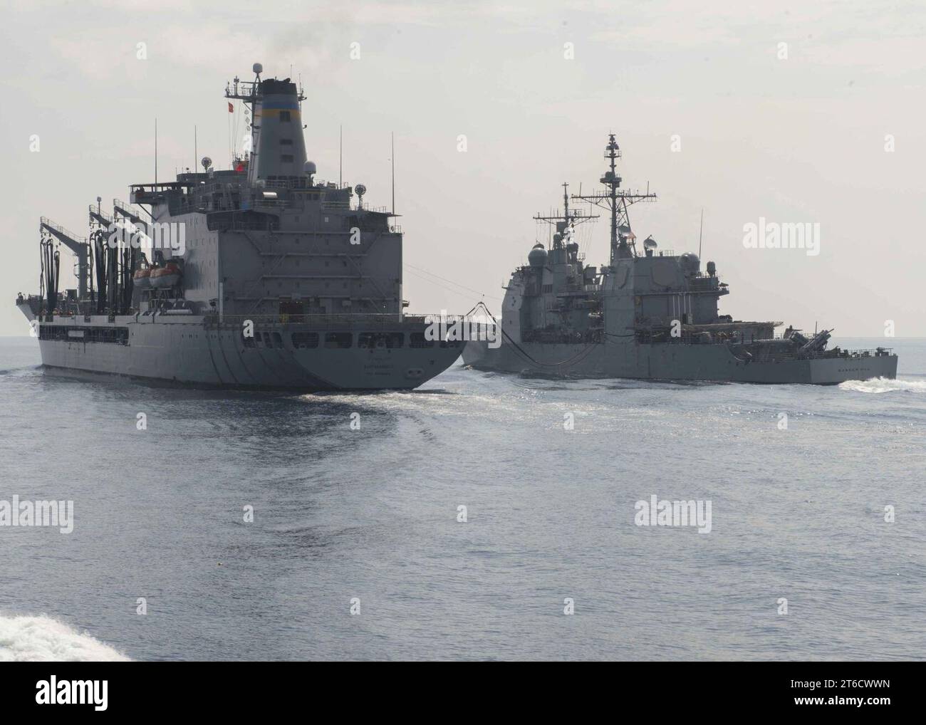 USS Bunker Hill onducts a replenishment-at-sea with USNS Rappahannock ...