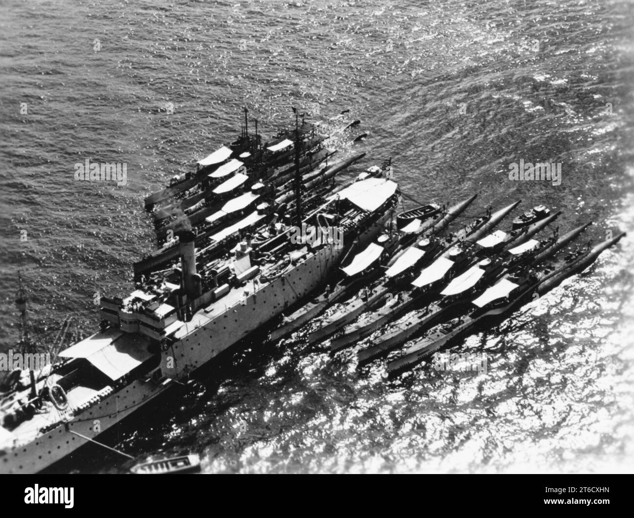 USS Camden (AS-6) with ten S-class submarines alongside, circa the ...