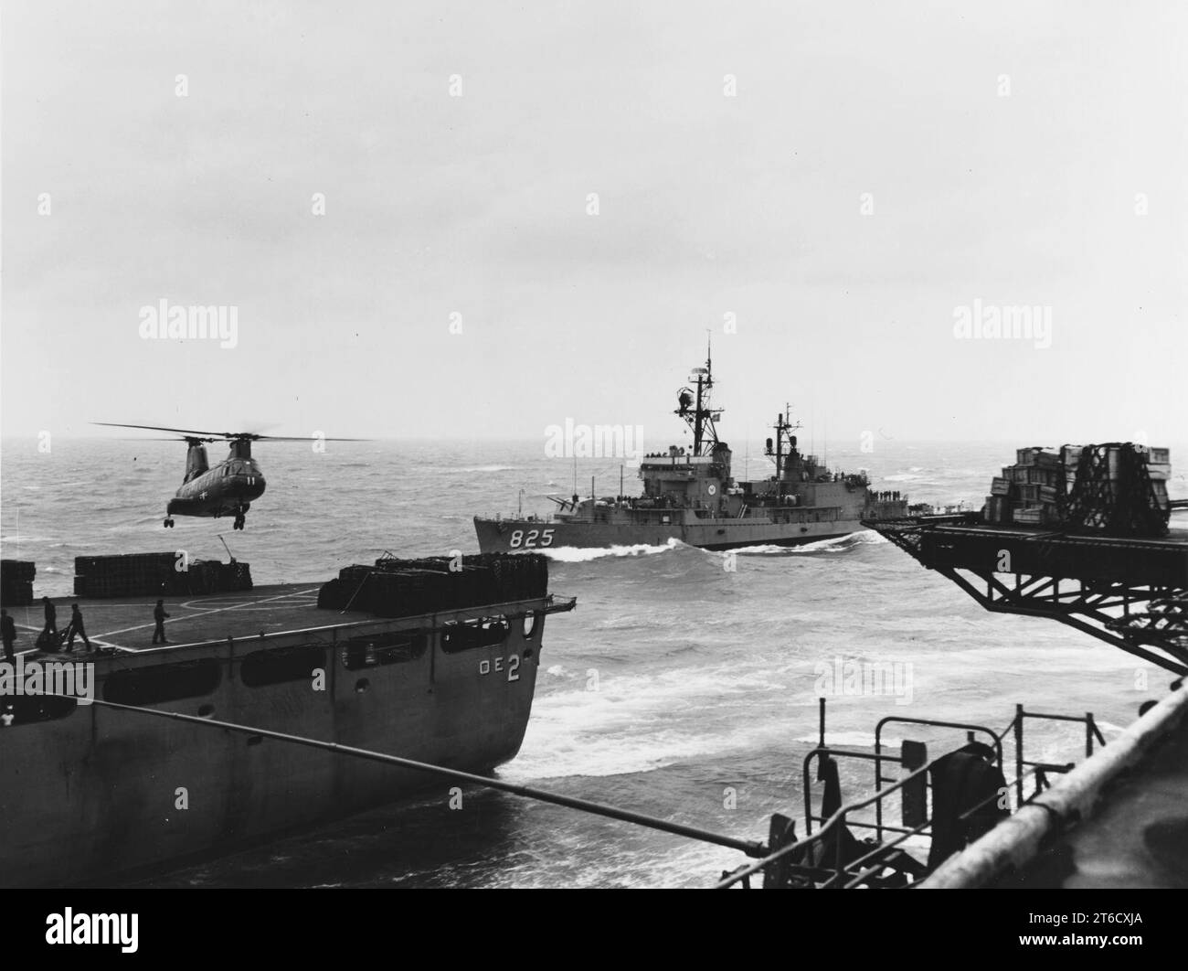 USS Camden (AOE-2) with USS Carpenter (DD-825) off Vietnam in February ...