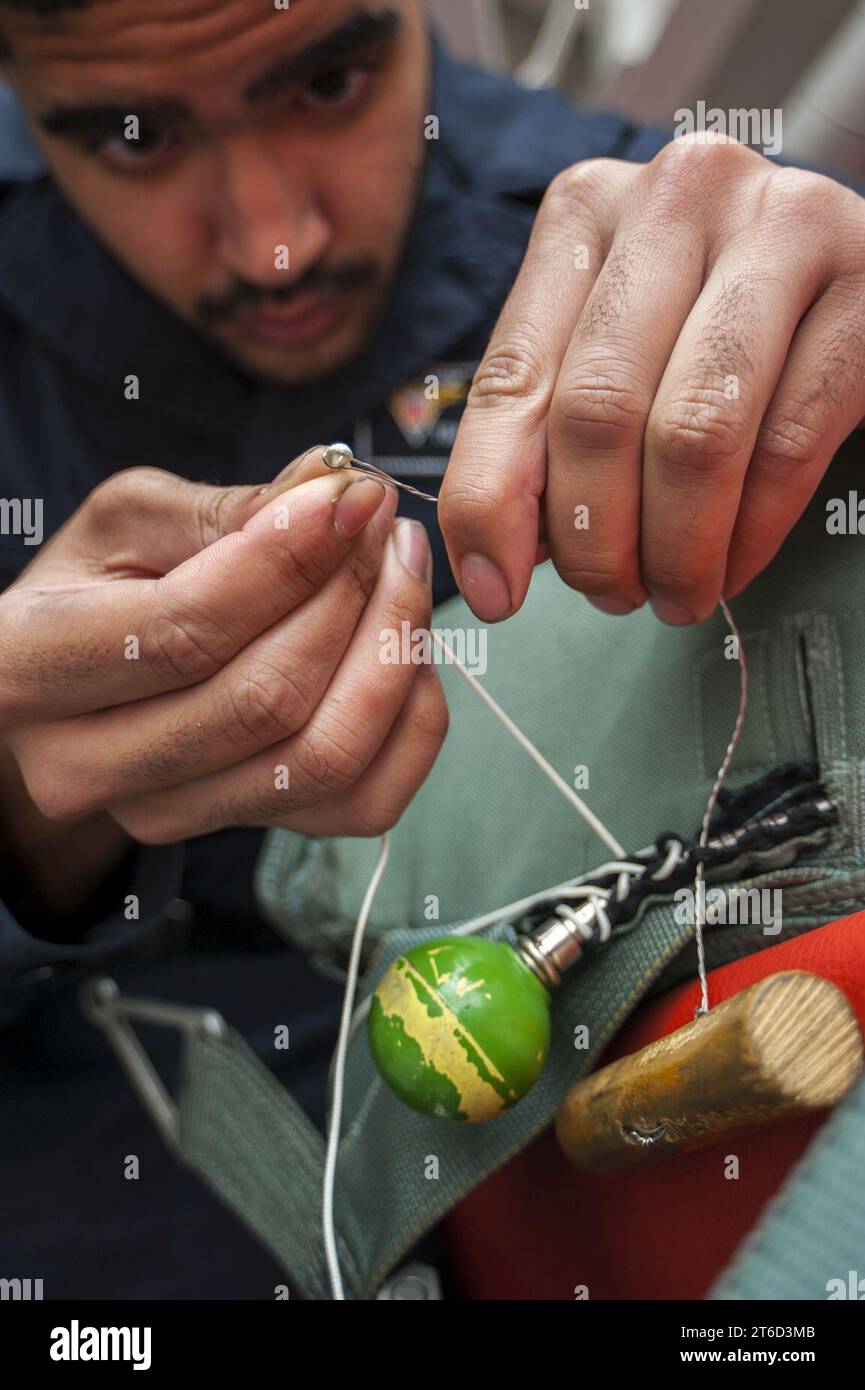 USS Carl Vinson Sailors conduct parachute maintenance 141111 Stock ...