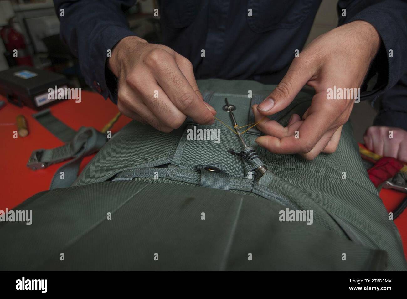 USS Carl Vinson Sailors conduct parachute maintenance 141111 Stock ...