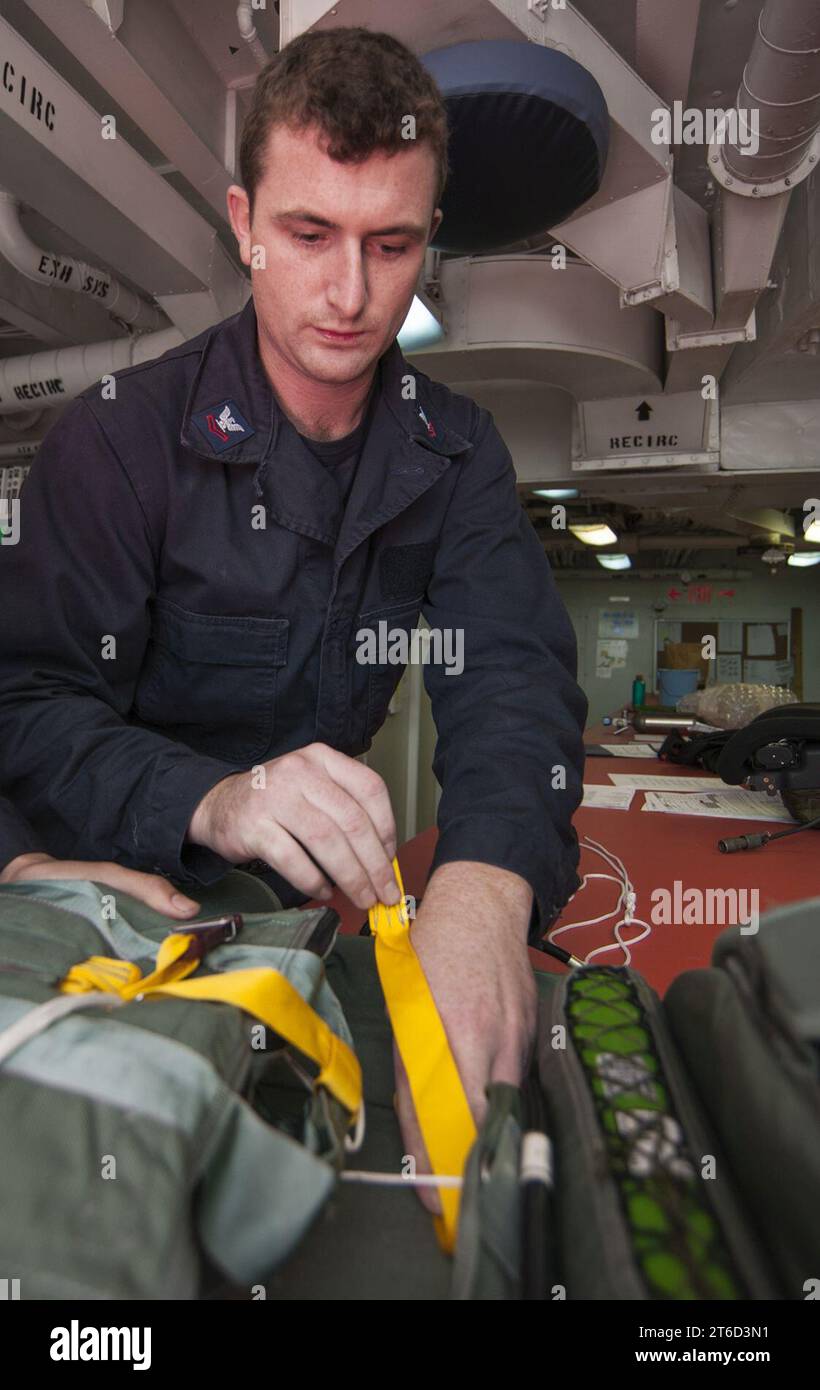 USS Carl Vinson Sailors conduct parachute maintenance 141111 Stock ...