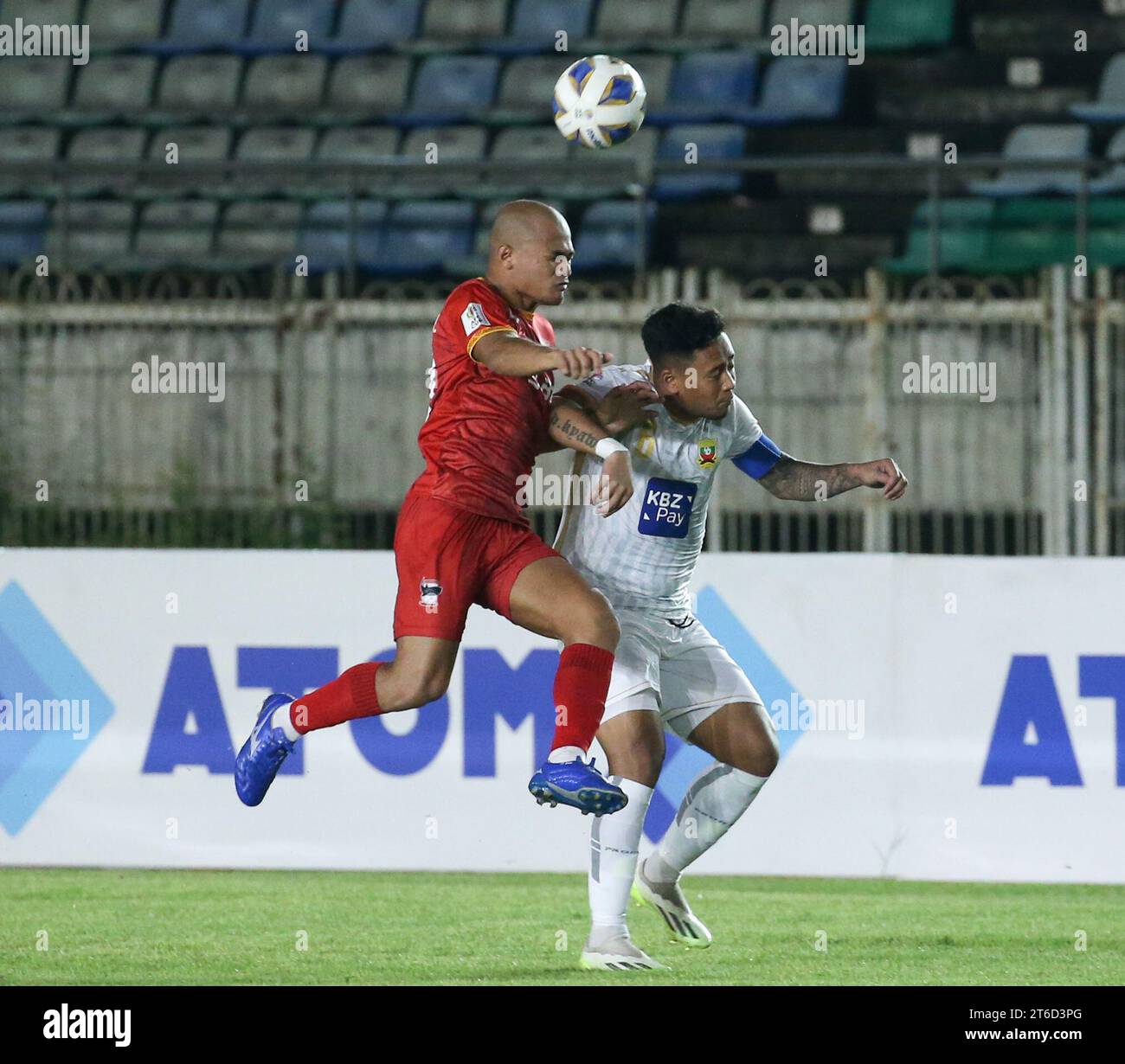 Yangon, Myanmar. 9th Nov, 2023. Roberto Jr. Corsame (L) of the Philippines' Dynamic Herb Cebu FC ...