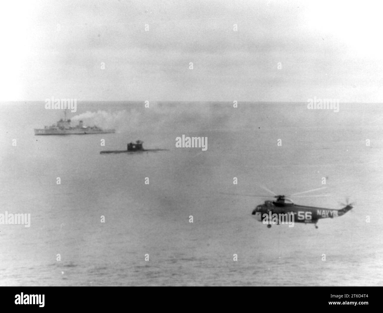 USS Carpenter (DD-825) and SH-3A of HS-2 with Soviet submarine in the ...