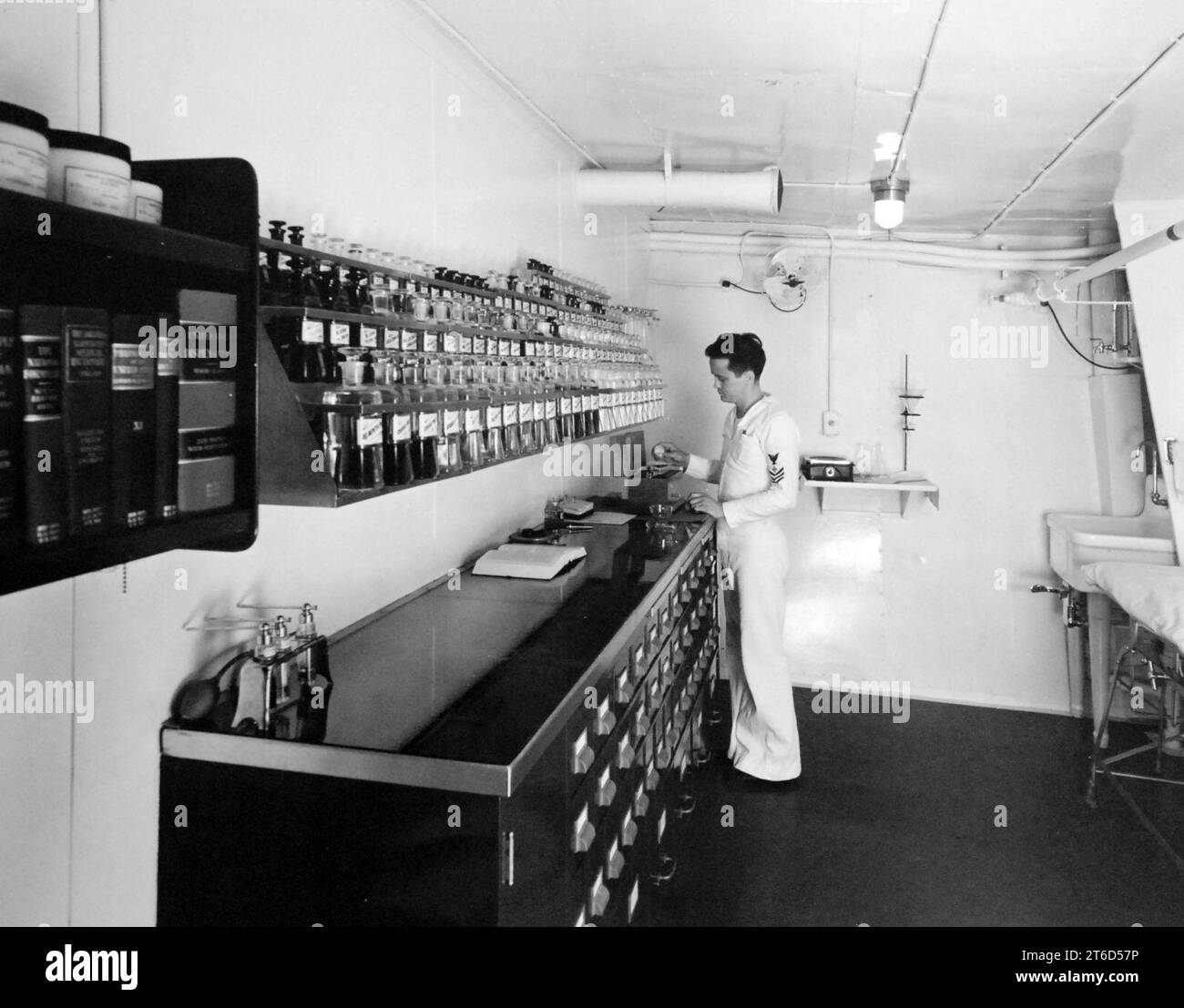 USS Charger (ACV-30) preparing a perscription in the ship's dispensary ...