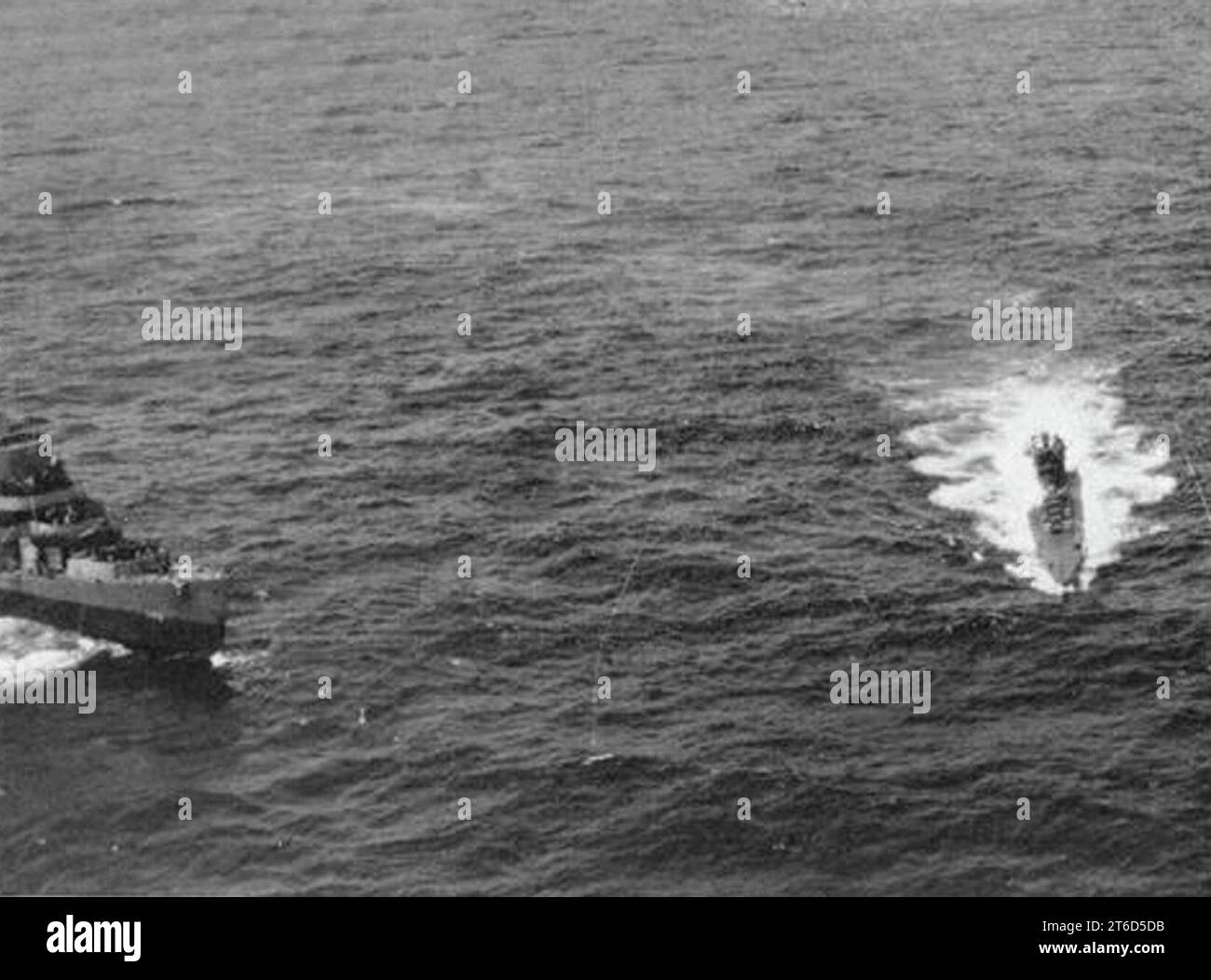 USS Chatelain (DE-149) closing on the damaged German submarine U-505 in ...