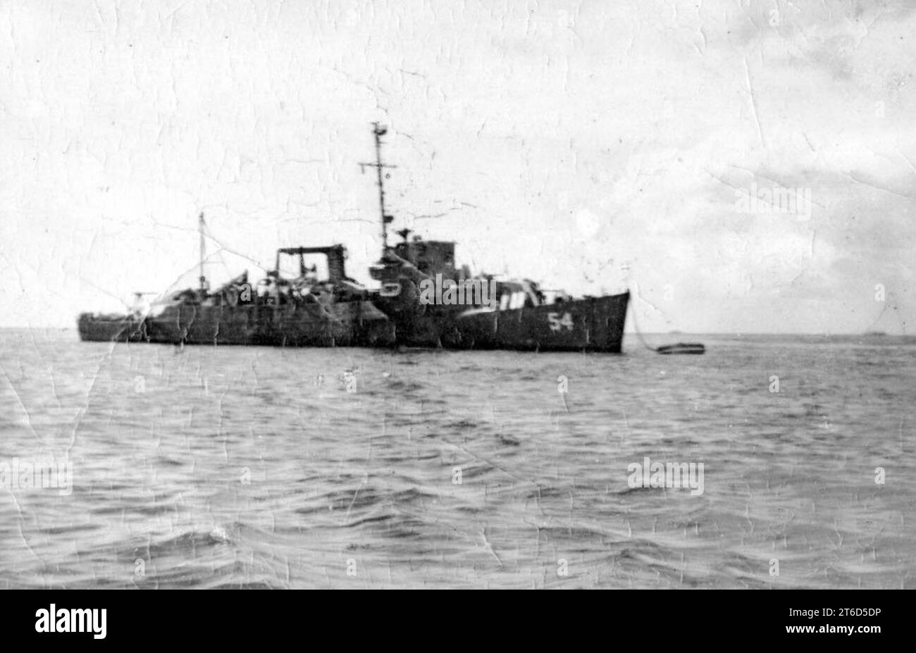 USS Chase (APD-54) moored to a buoy at Kerama Retto, Japan, circa in ...