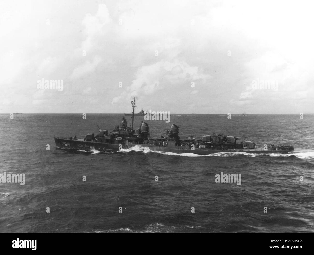 USS Charrette (DD-581) screening USS New Jersey (BB-62) during the ...