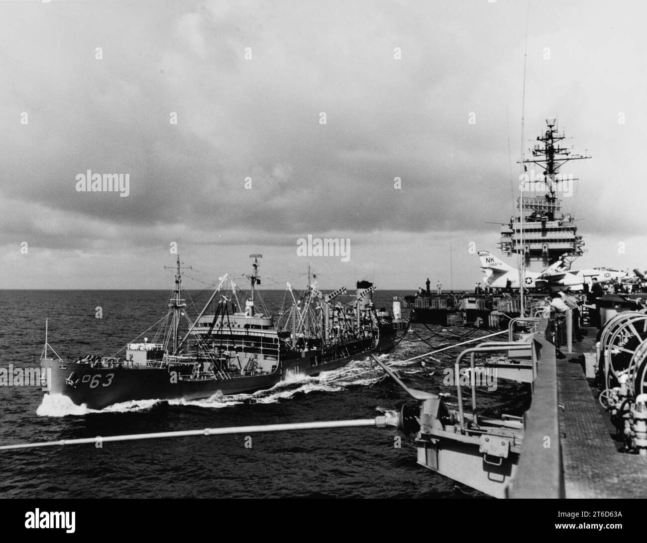 USS Chipola (AO-63) alongside USS Constellation (CVA-64) in March 1964 ...