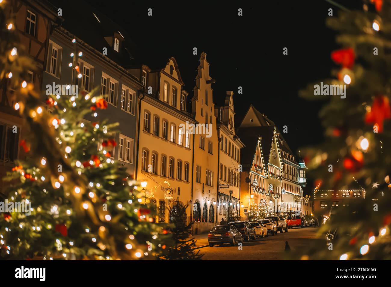Christmas in Europe. Christmas tree with balls and shining garlands ...