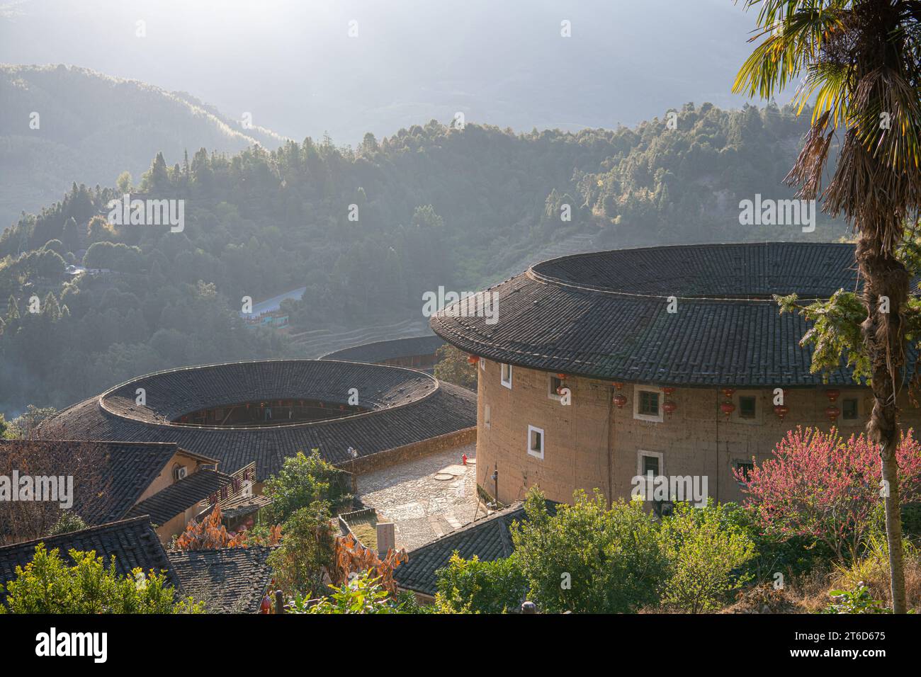 Traditional earthen Tulou Chinese huts, a landmark tourist attraction ...