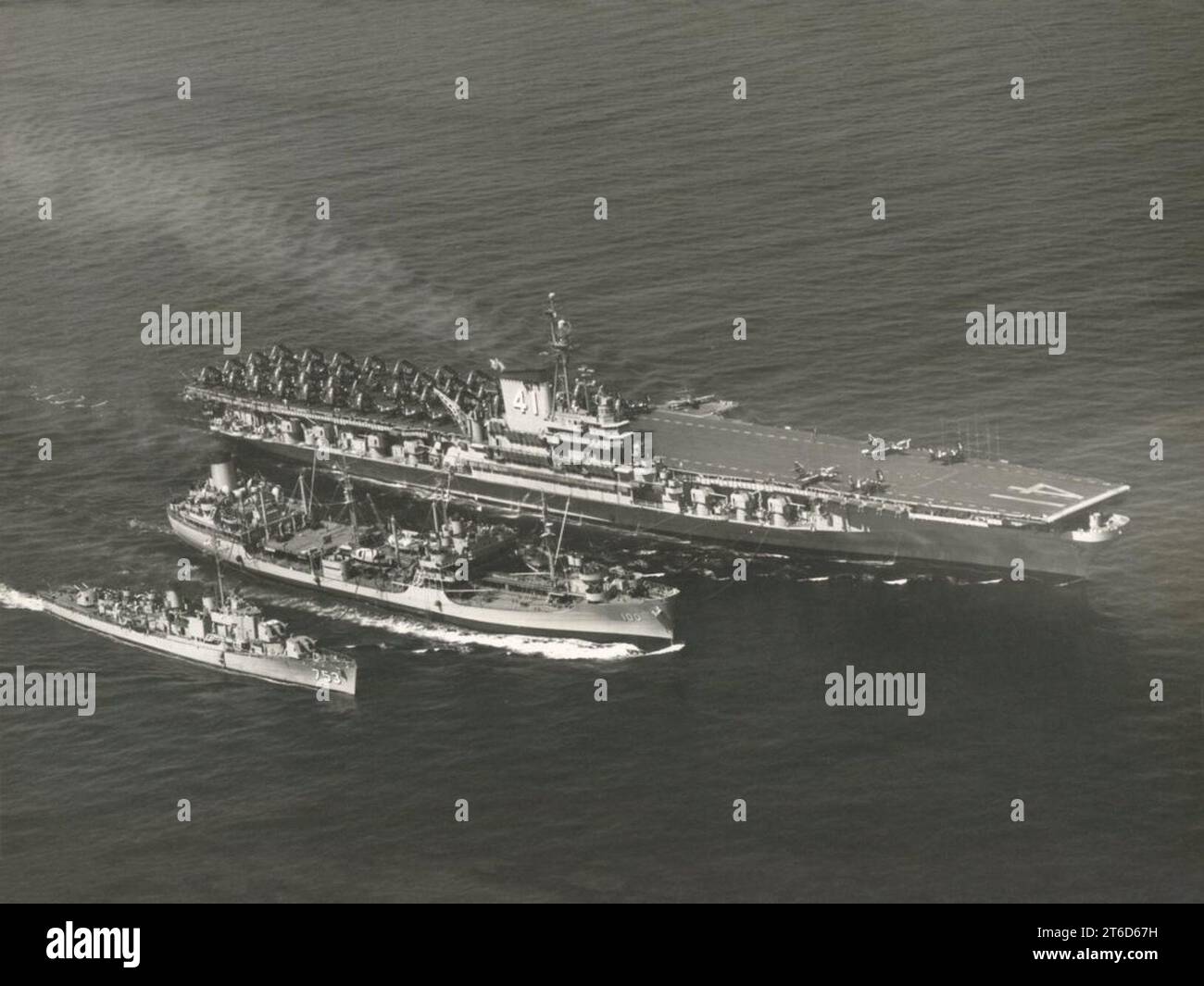 USS Chukawan (AO-100) refuels USS Midway (CVB-41) and USS John R ...
