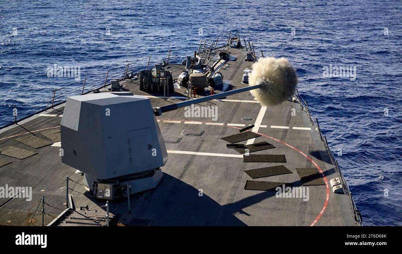 USS Chung-Hoon (DDG 93) conducts a MK 45 5-inch gun live fire during ...