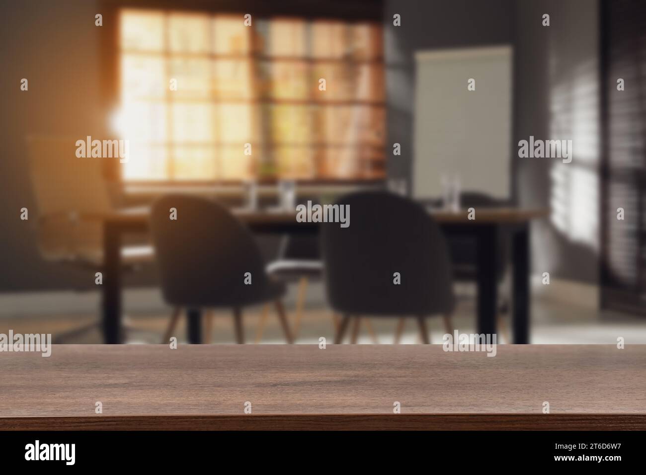 Empty wooden table in comfortable office. Space for design Stock Photo ...