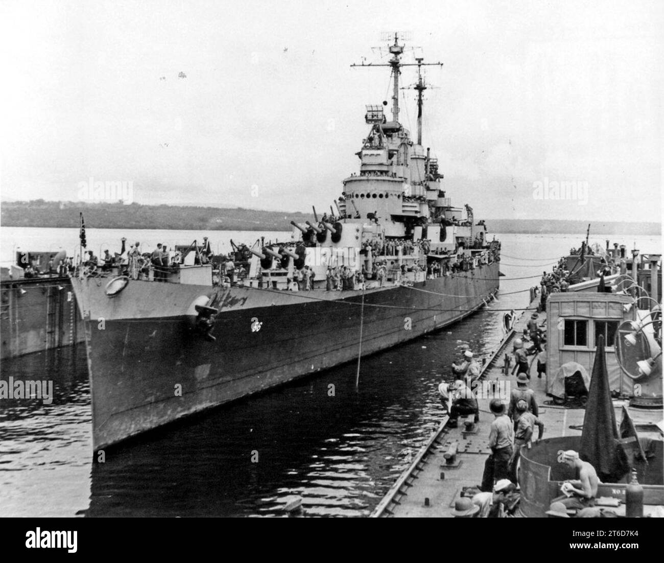 USS Columbia (CL-56) docks in ABSD-1 at Espiritu Santo, in January 1944 Stock Photo - Alamy