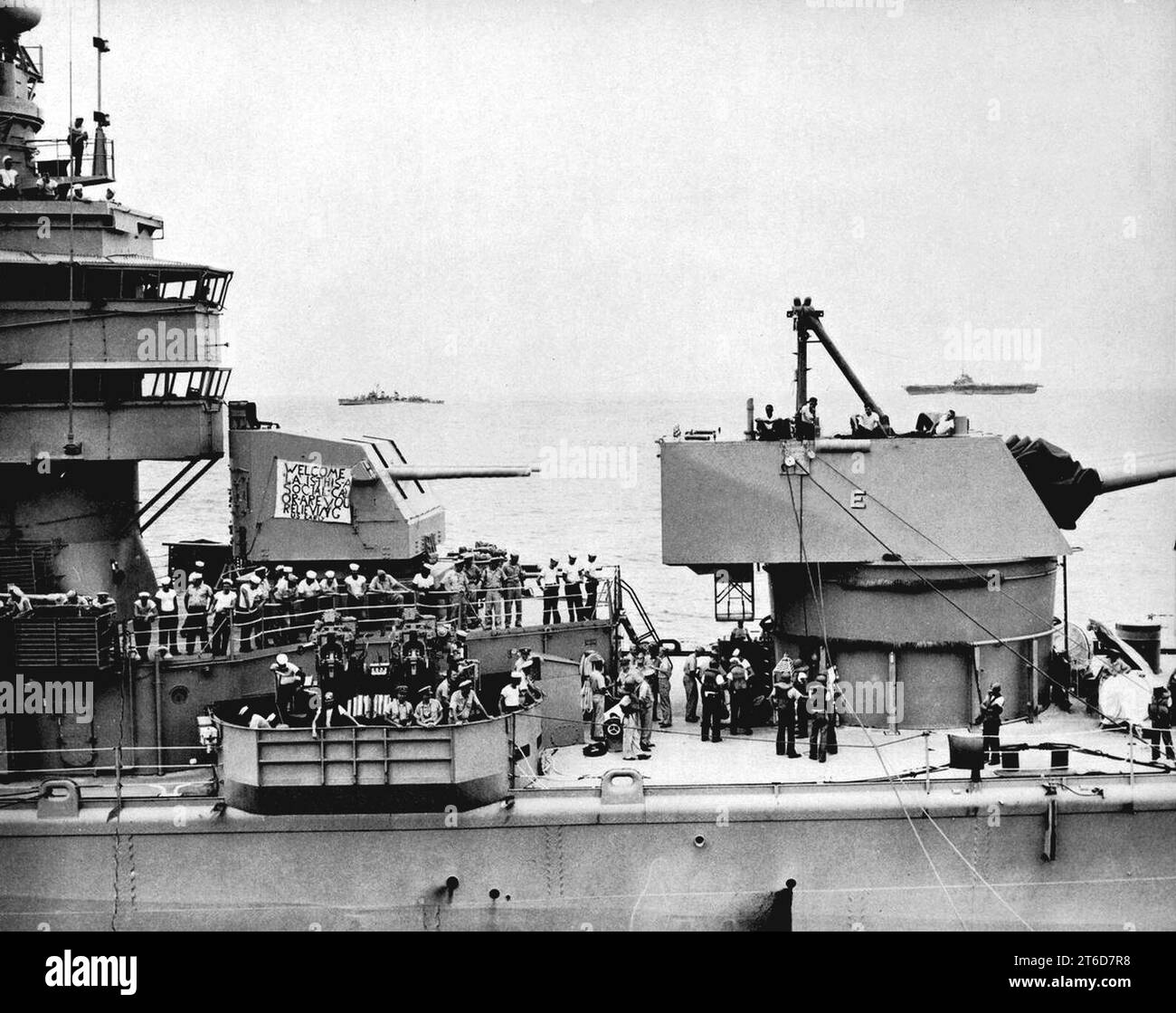 USS Columbus (CA-74) during a highline transfer in the Pacific Ocean in ...