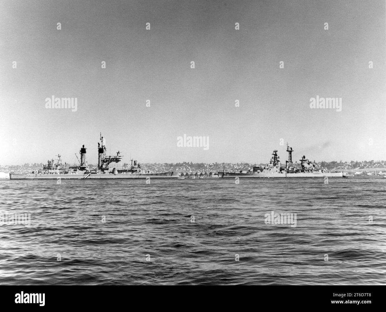 USS Columbus (CG-12) and USS Oklahoma City (CLG-5) moored at San Diego ...