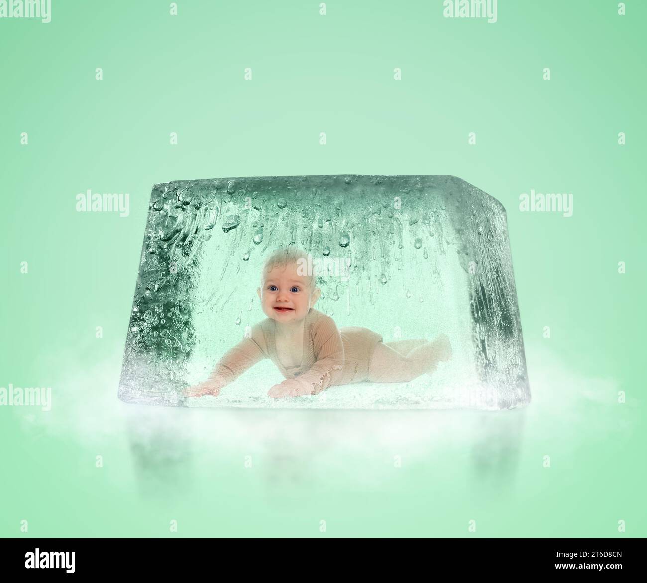 Cryopreservation as method of infertility treatment. Baby in ice cube ...