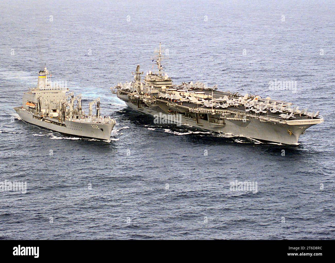 USS Constellation (CV-64) unrep with USNS Yukon Stock Photo - Alamy