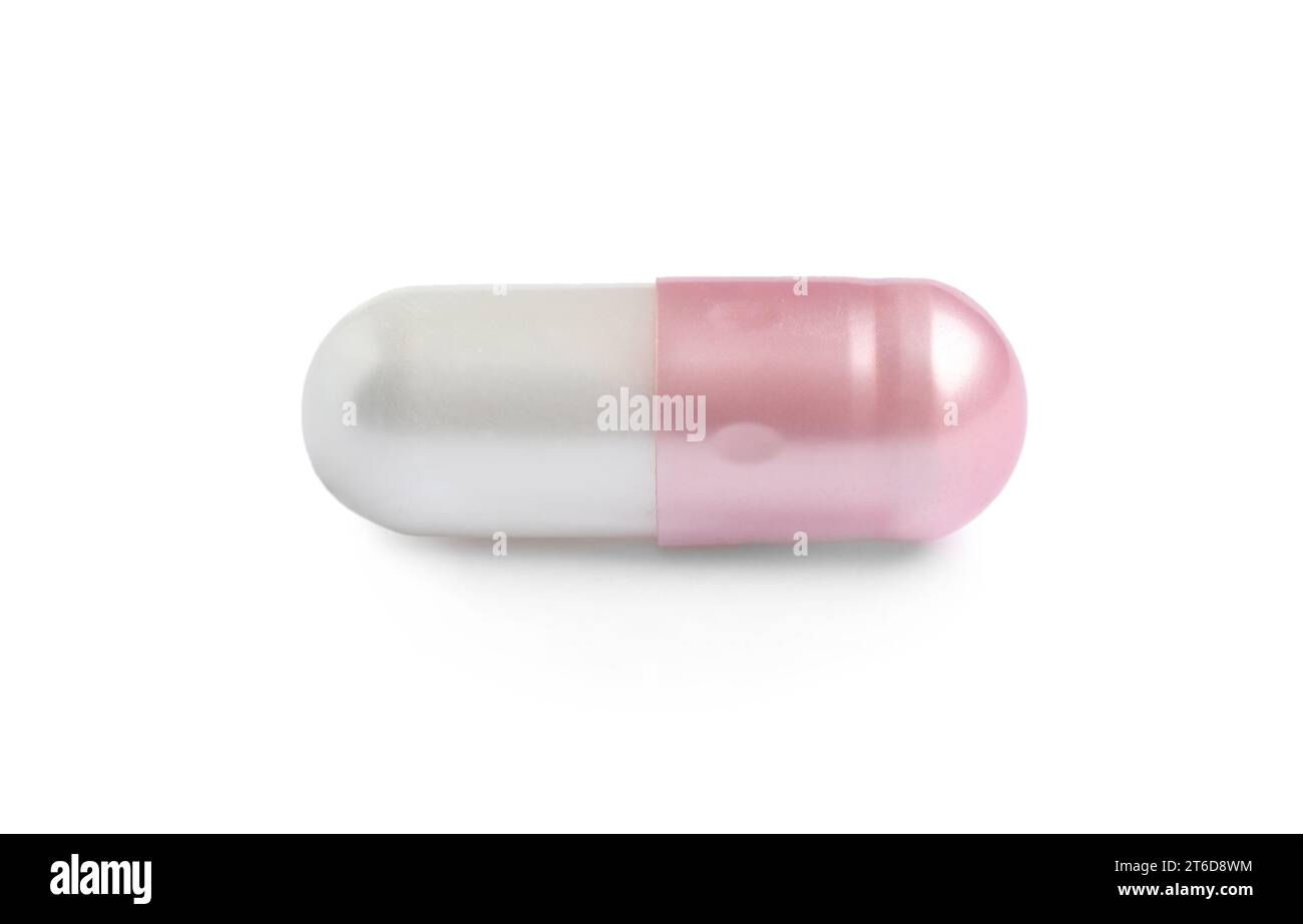 One pill on white background. Medicinal treatment Stock Photo - Alamy