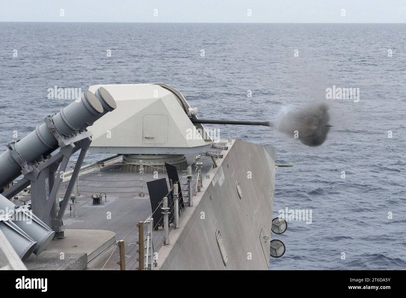 USS Coronado fires a Mark 110 57 mm gun during a live-fire exercise ...