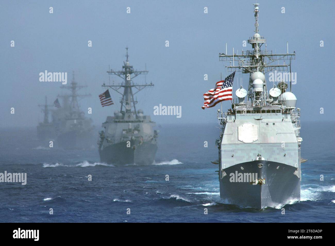 USS Cowpens (CG 63) leads the formation of USS Lassen (DDG 82), USS ...