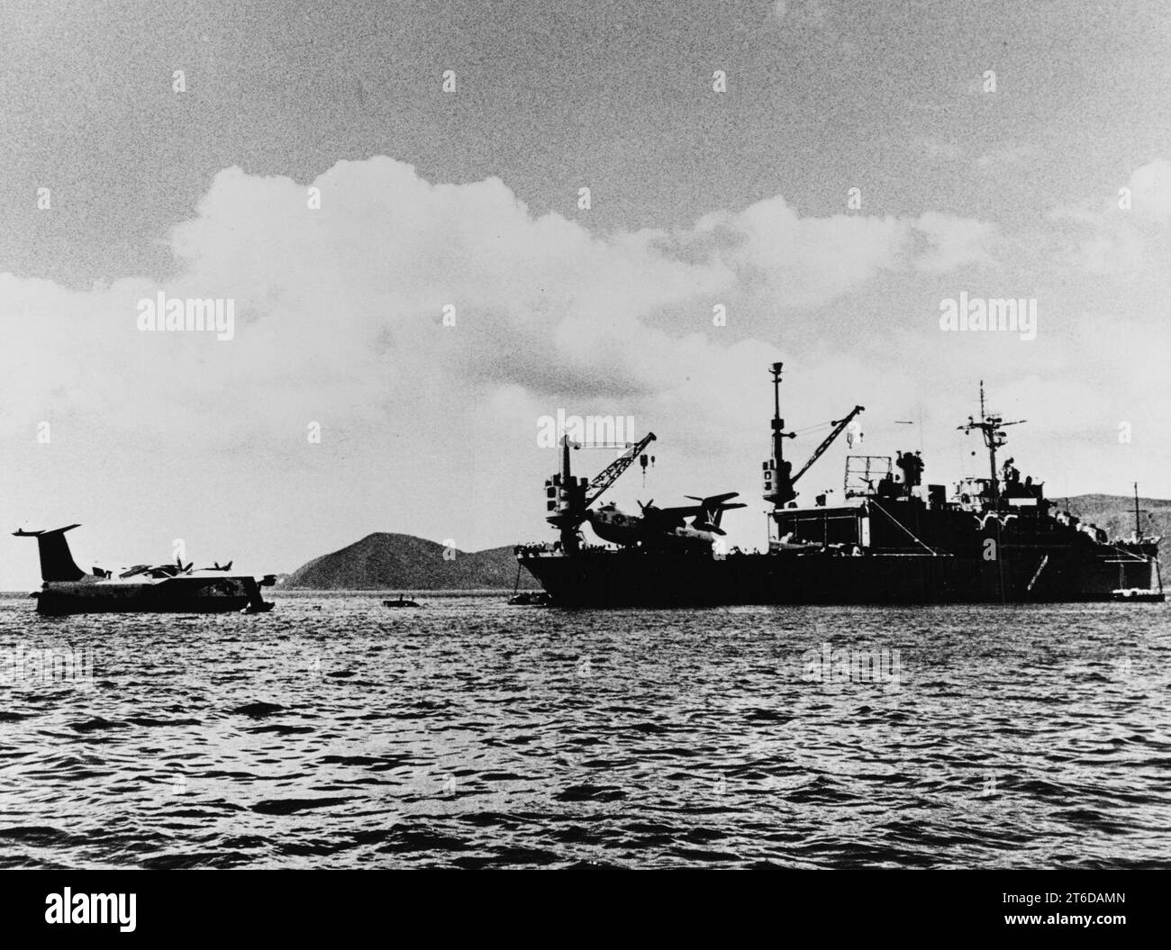 USS Currituck (AV-7) at anchor in Cam Ranh Bay with SP-5B Marlins in ...