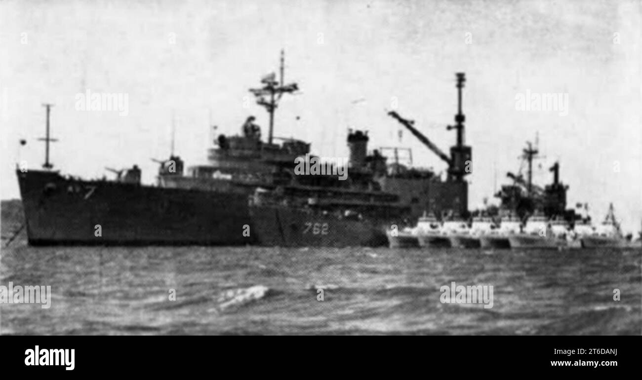 USS Currituck (AV-7) with LST-762 and USCG ships in Vietnam 1965 Stock ...