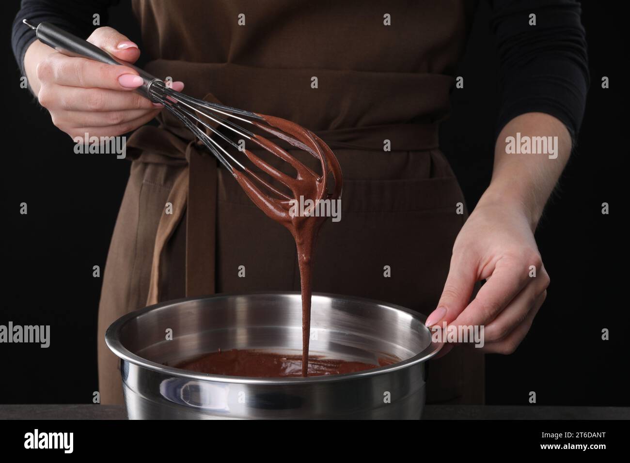 Woman mixing hot sauce hi-res stock photography and images - Alamy