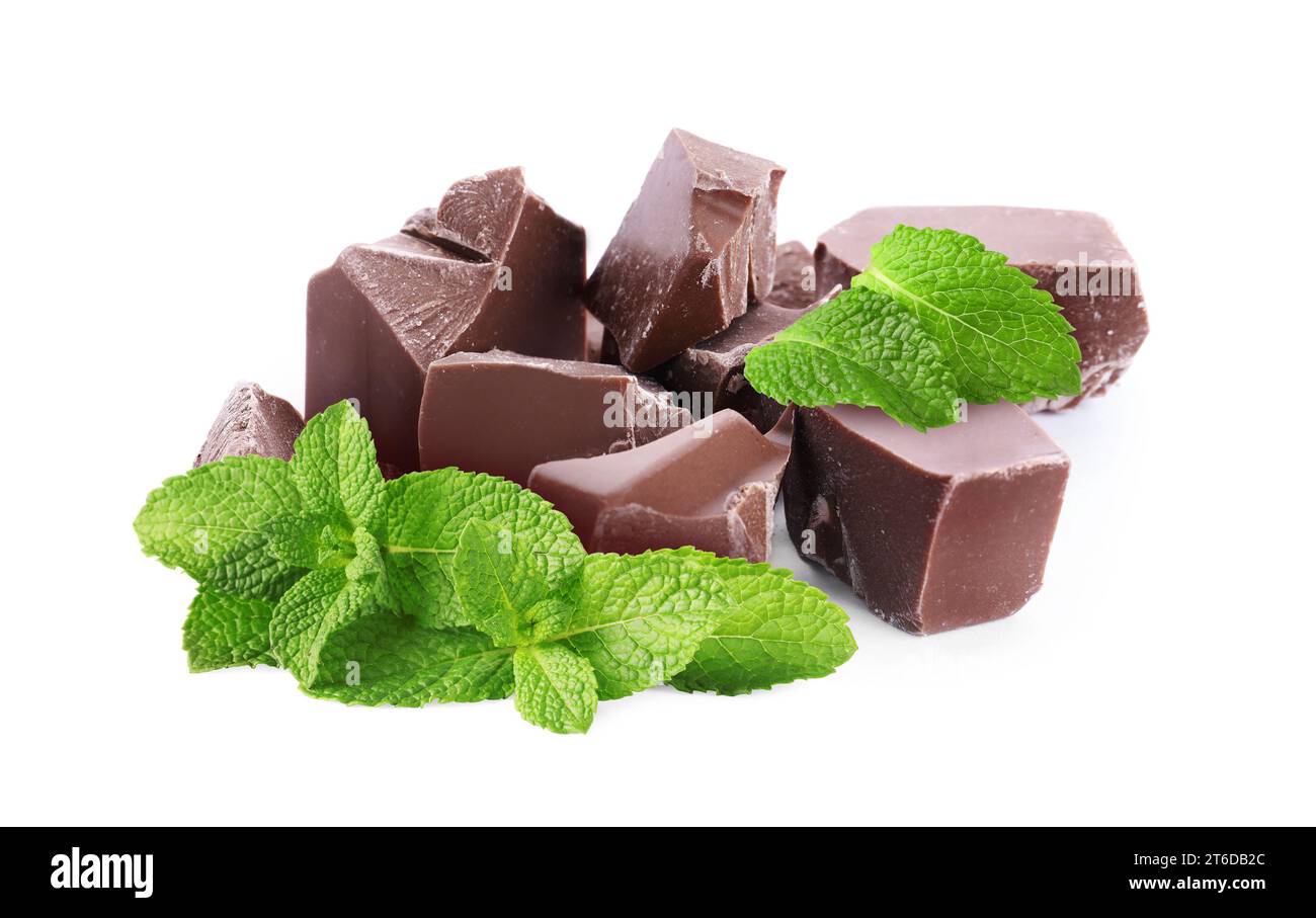 Milk chocolate chunks and mint leaves isolated on white Stock Photo - Alamy